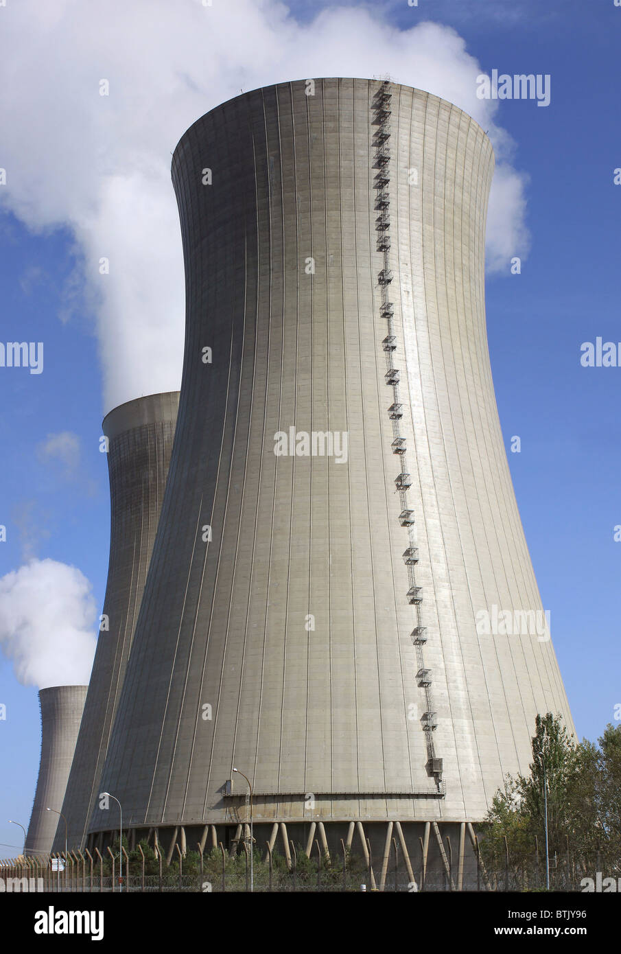 photo of a nuclear power plant chimneys active Stock Photo - Alamy