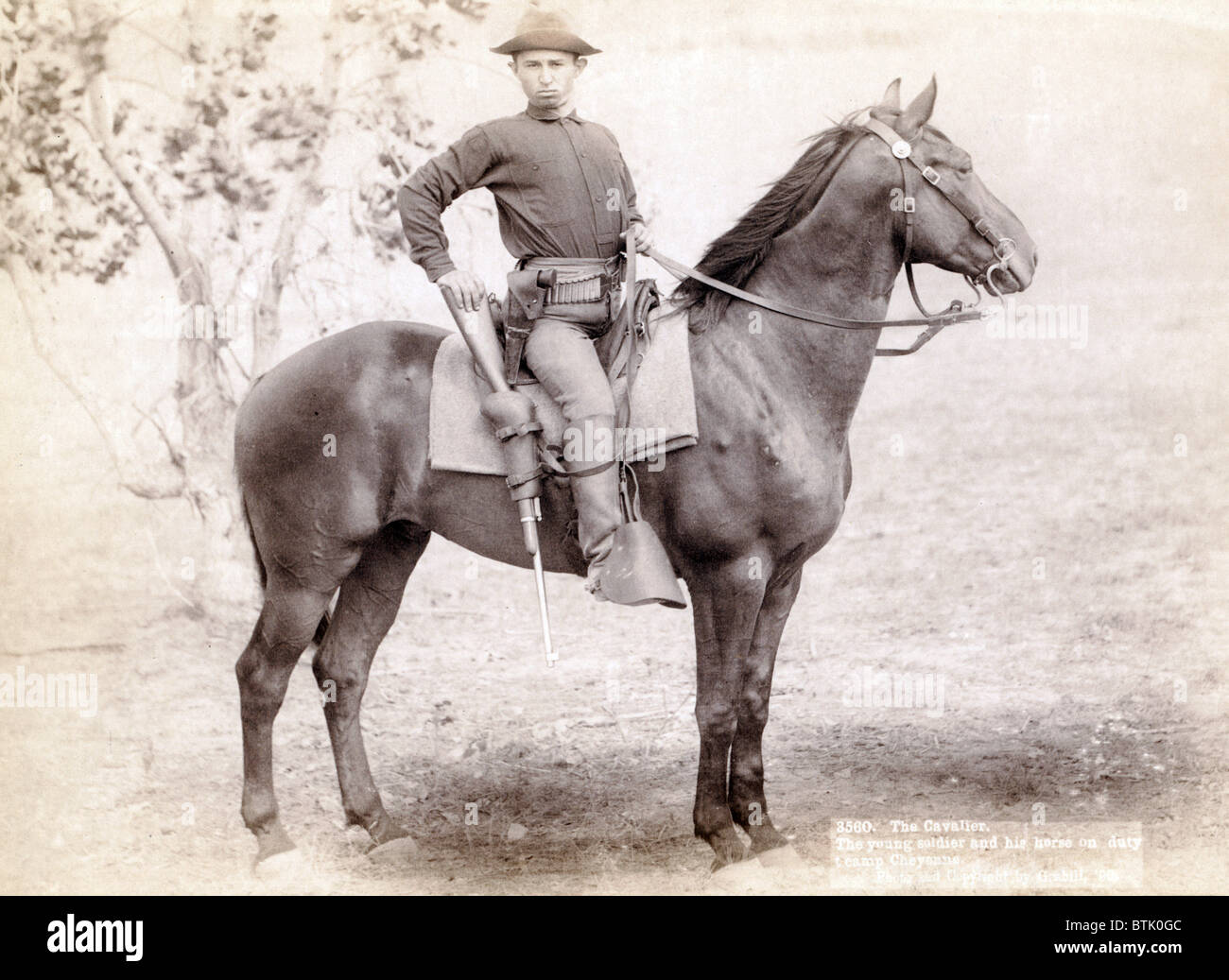 Wild West. The Cavalier. The young soldier and his horse on duty at ...