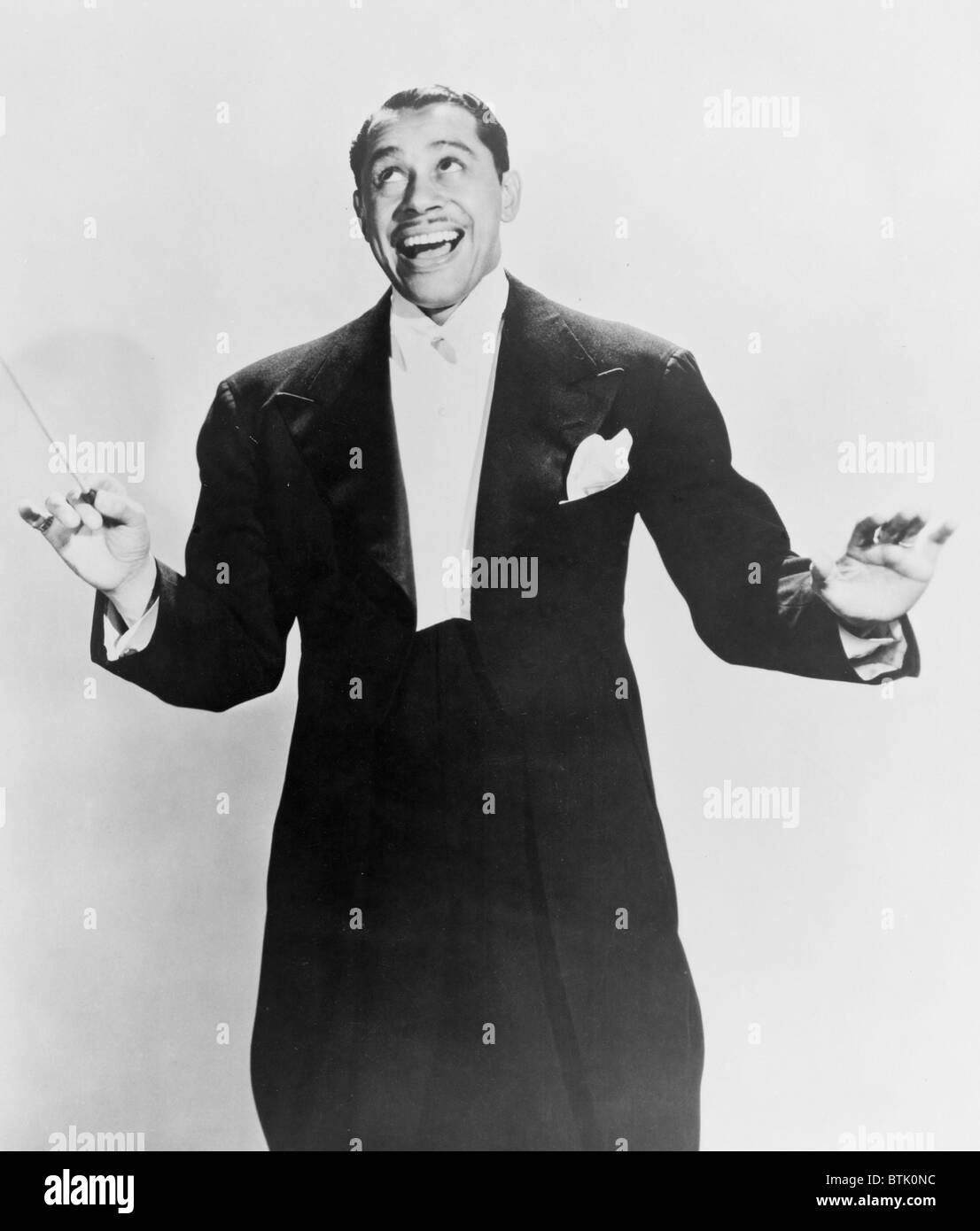 Cab Calloway (1907-1994), flamboyant African America bandleader holding ...