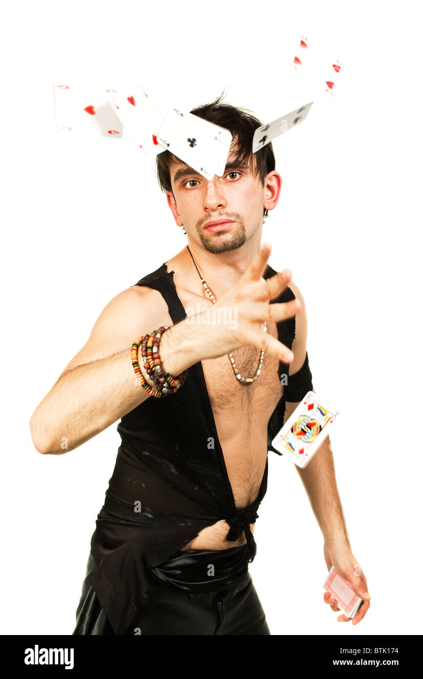 handsome young man throwing playing cards isolated on a white ...
