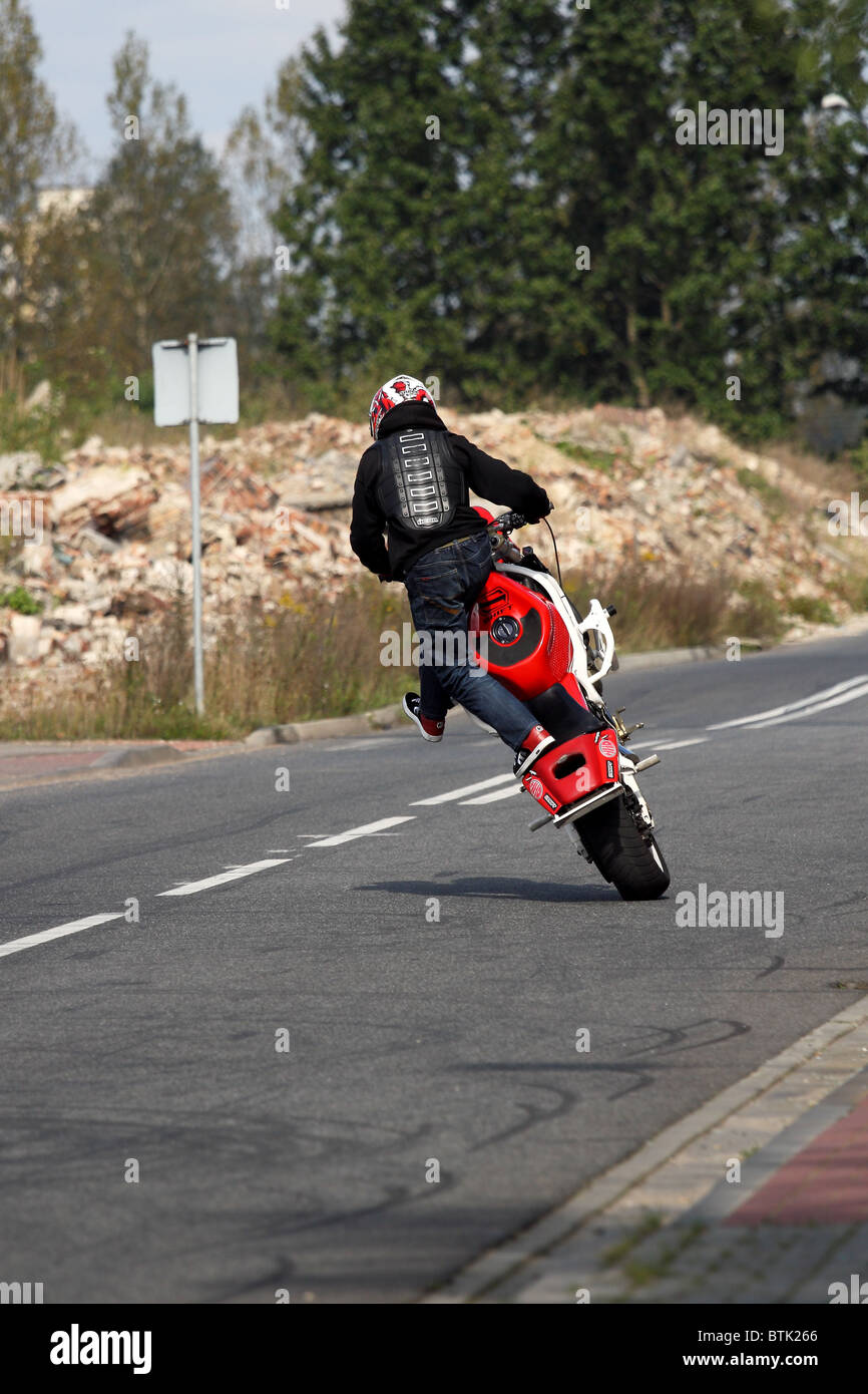 Balancing on rear wheel hi-res stock photography and images - Alamy