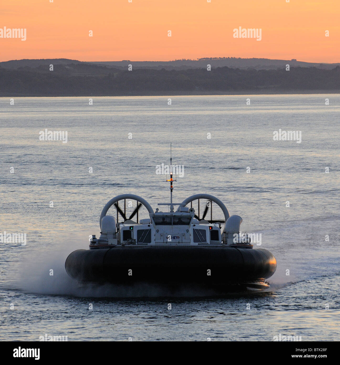 Solent Express a passenger hovercraft on The Solent with a backdrop of ...