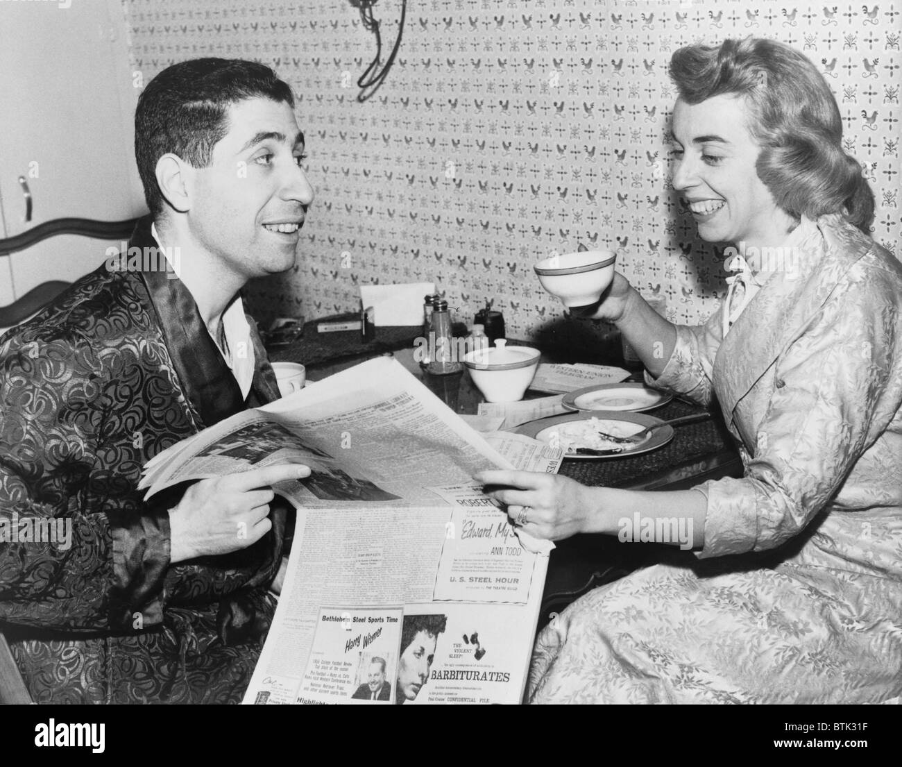 Dr. Joyce Brothers (b. 1925) having breakfast and reading newspaper ...