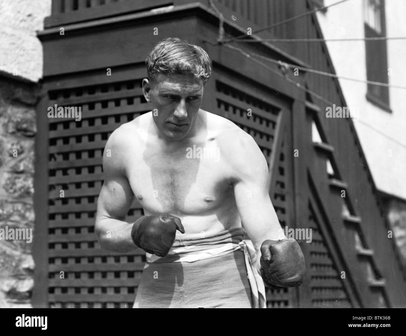 Boxing. Bombardier Billy Wells, English boxer, preparing in Rye, N.Y ...
