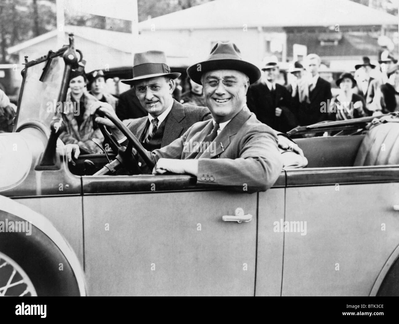 President Franklin D. Roosevelt driving with passenger Treasury ...