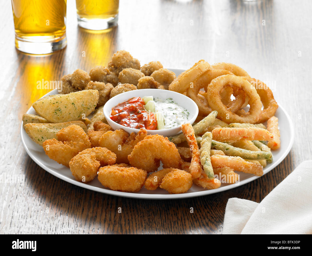 sharing plate of nibbles and dip Stock Photo - Alamy