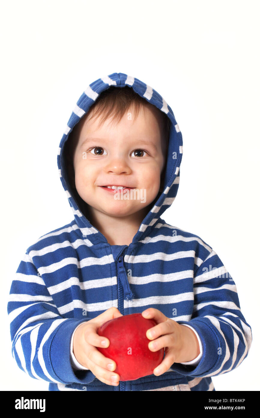 laughing baby with red apple Stock Photo - Alamy