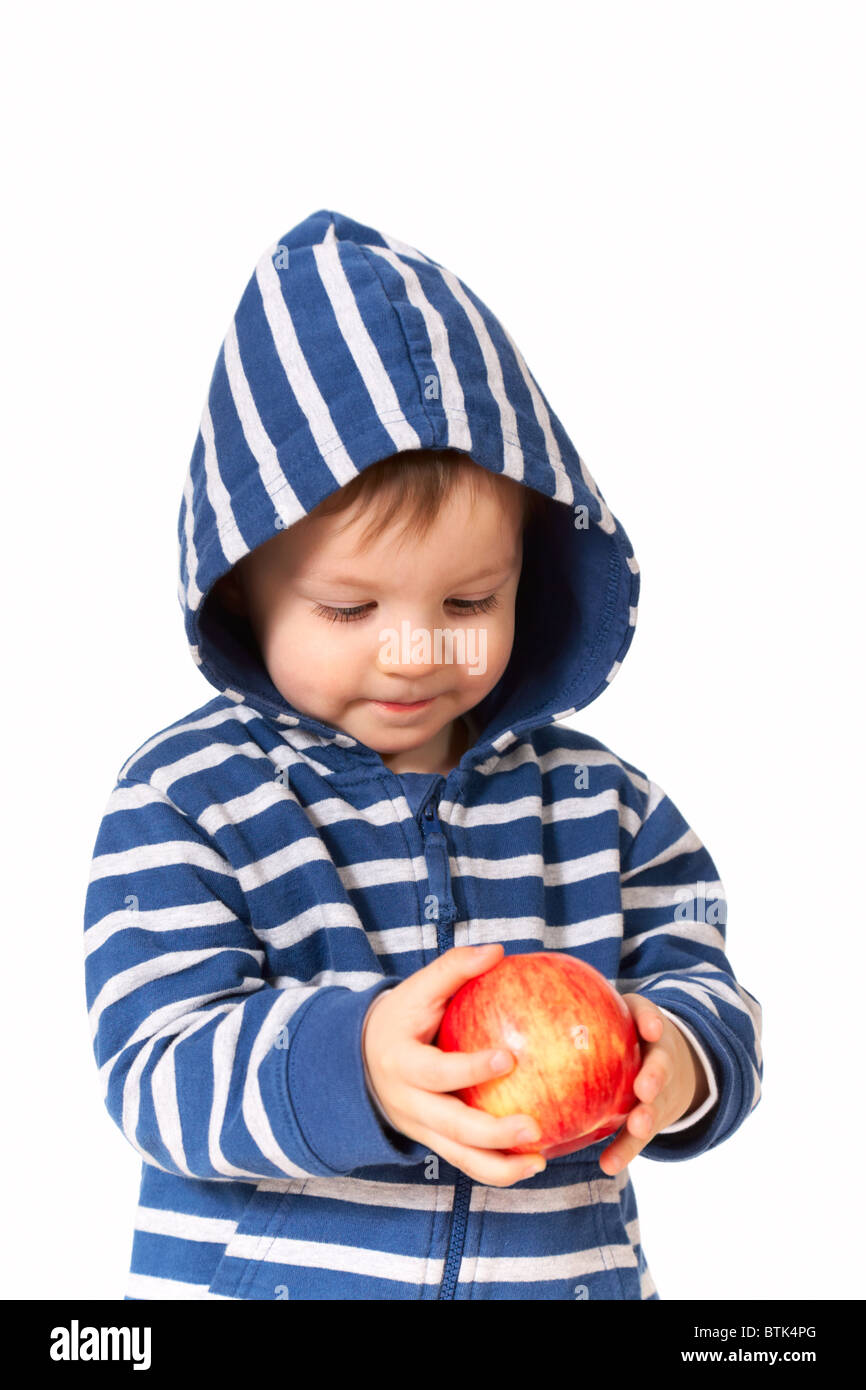 amazed baby with red apple Stock Photo - Alamy