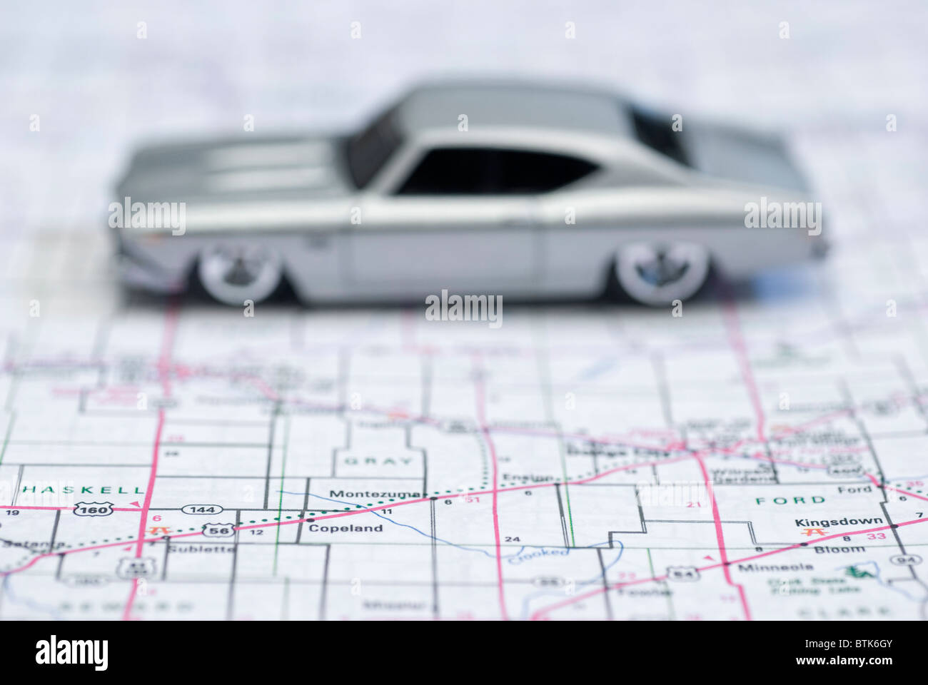 car on American road map Stock Photo - Alamy