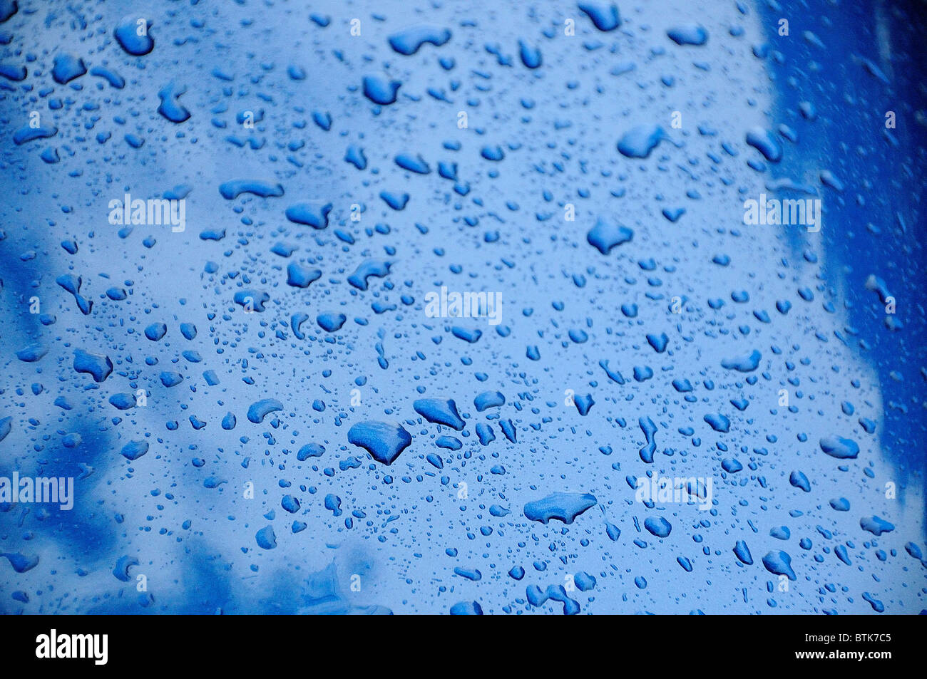 Rain drops on car bonnet hi-res stock photography and images - Alamy