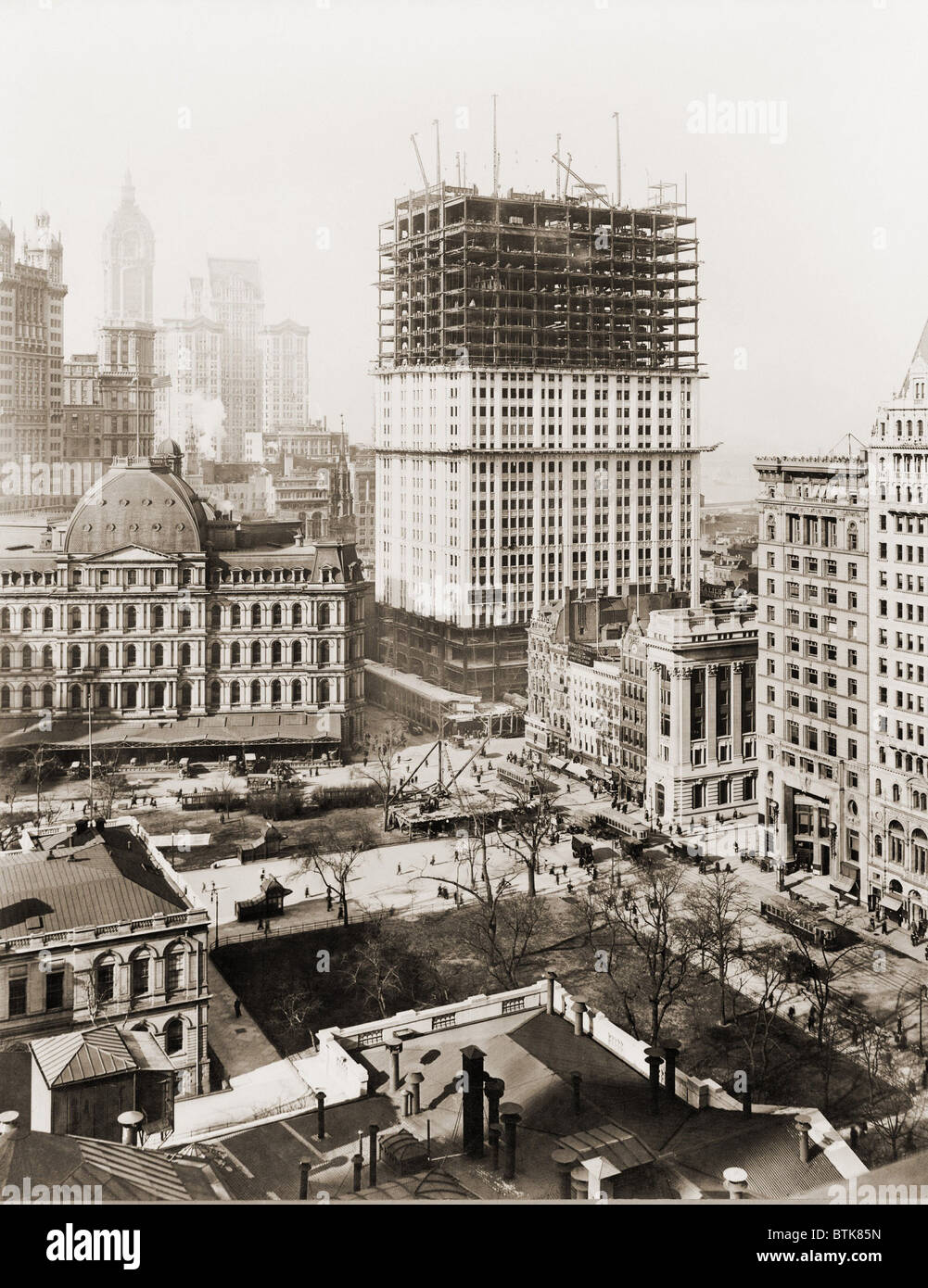 Woolworth Building, partially-constructed building amidst smaller ...