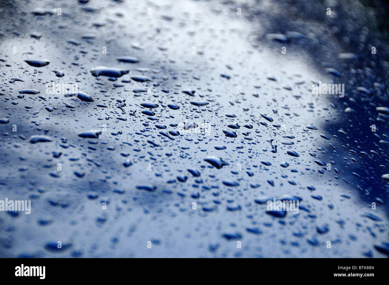 Rain drops on car bonnet hi-res stock photography and images - Alamy