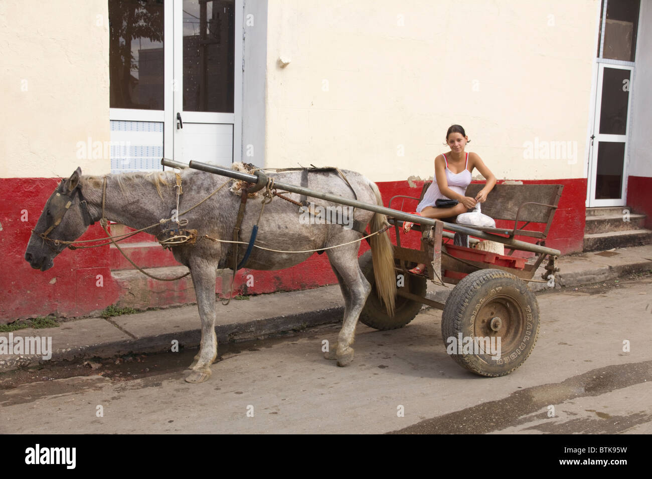 Cuban transport with a girl in white dress sitting on the cart Stock ...
