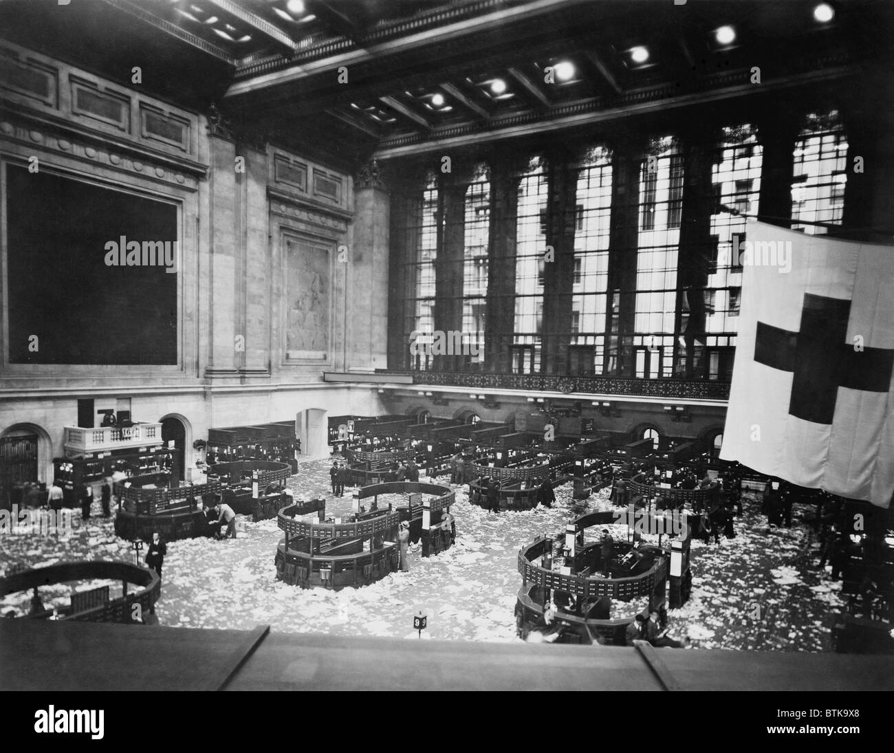 Littered floor of New York Stock Exchange after a day trading session ...