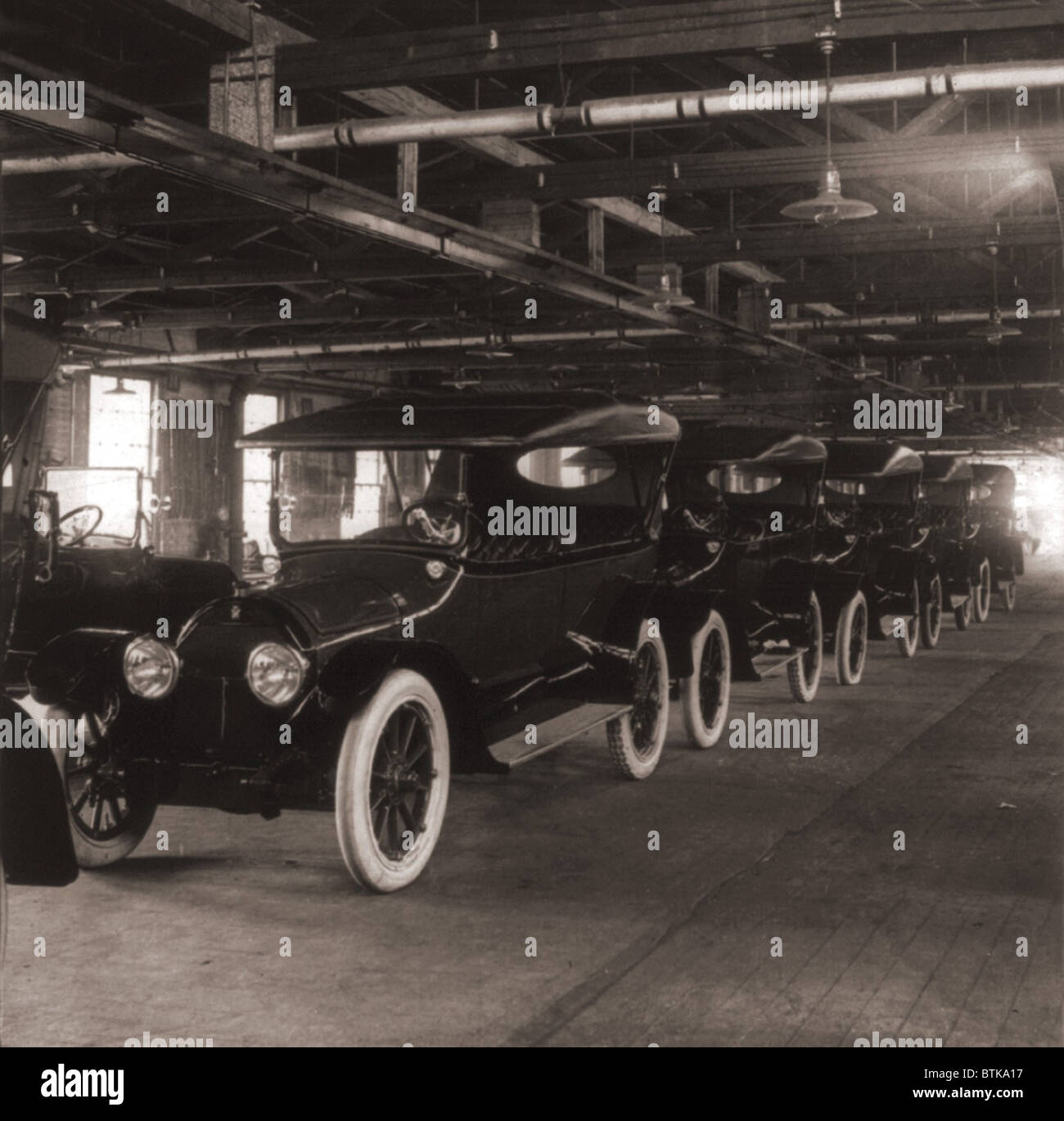 Row of Cadillac touring cars come off the assembly line in 1917 ...