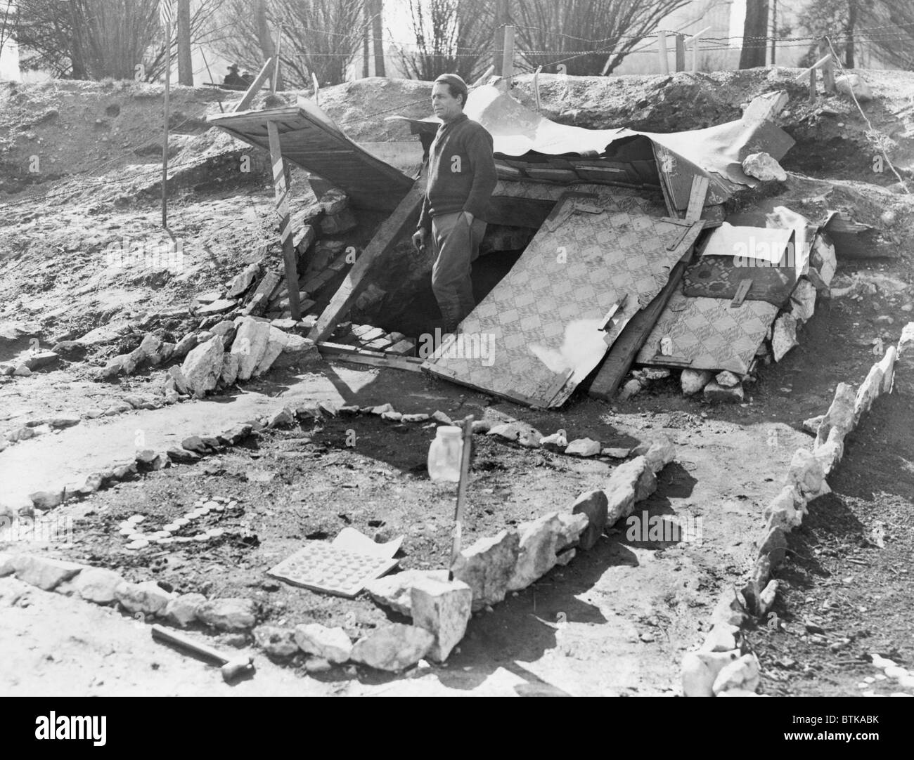 The Great Depression. An unemployed homeless man stands in the doorway ...
