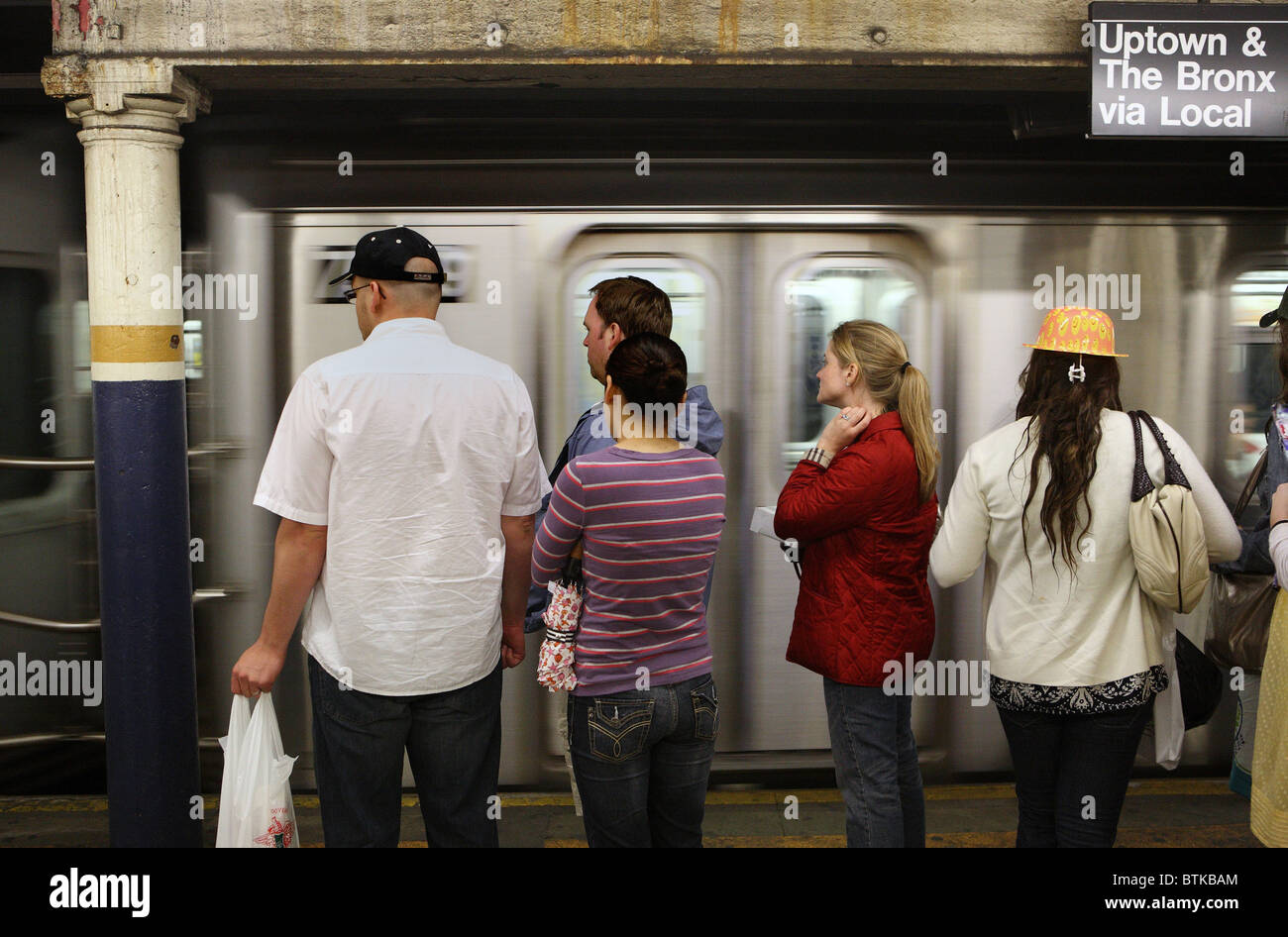 Subway train arriving crowded new hi-res stock photography and images ...