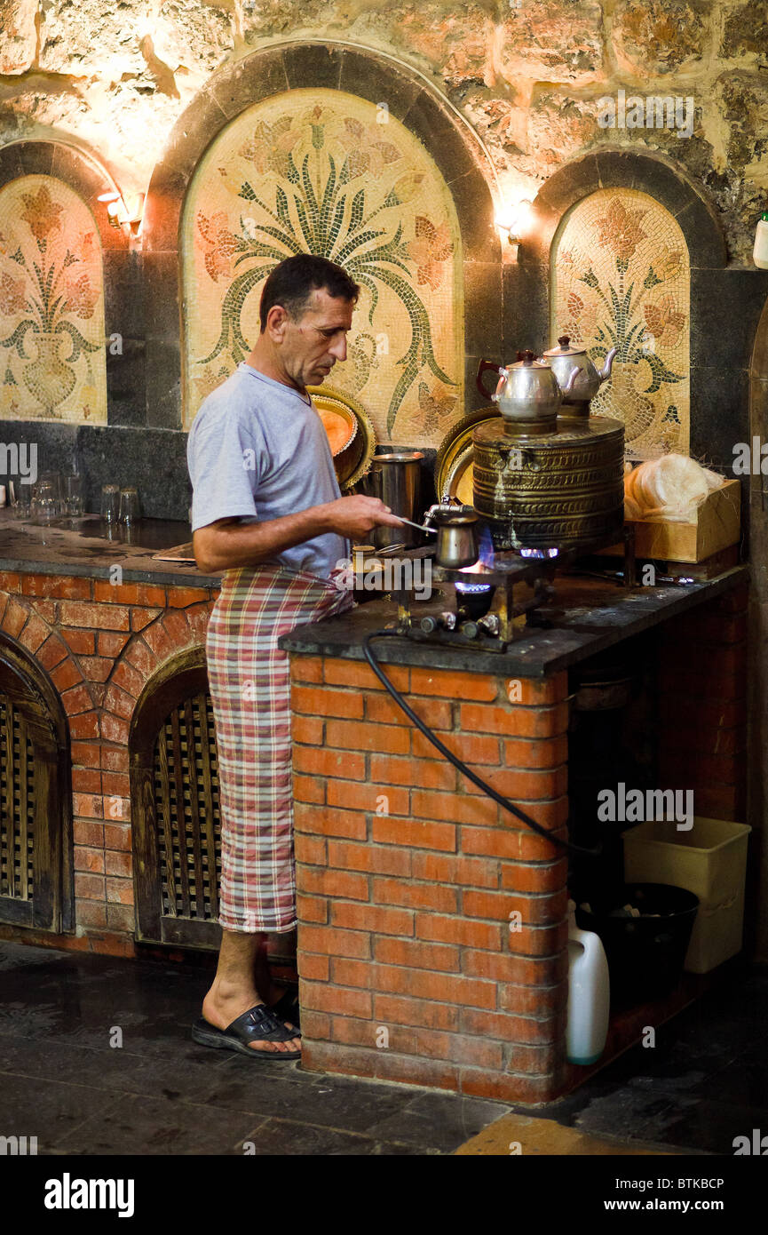 Man making tea in a hamam, a Turkish bath in Damascus, Syria Stock ...