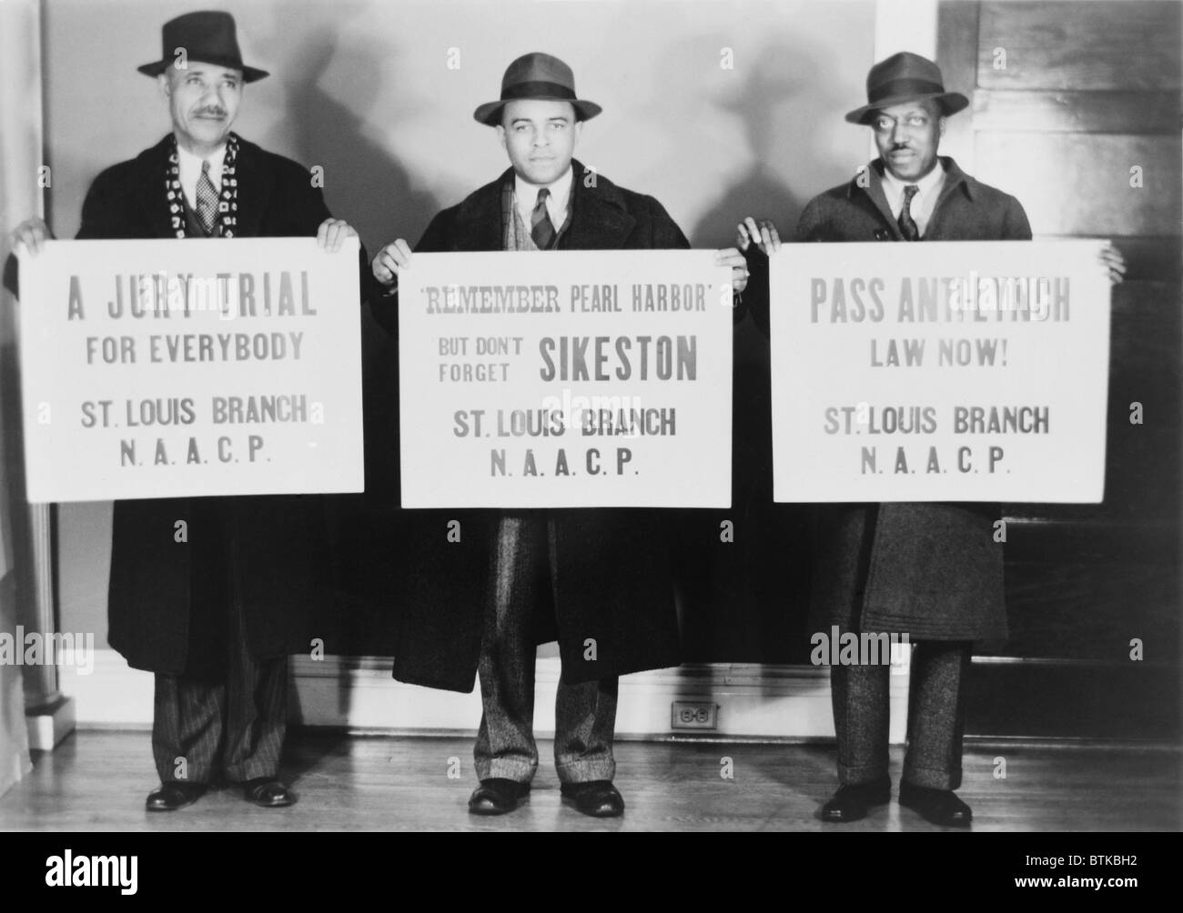Members of the St. Louis branch of the NAACP demonstrate against the ...
