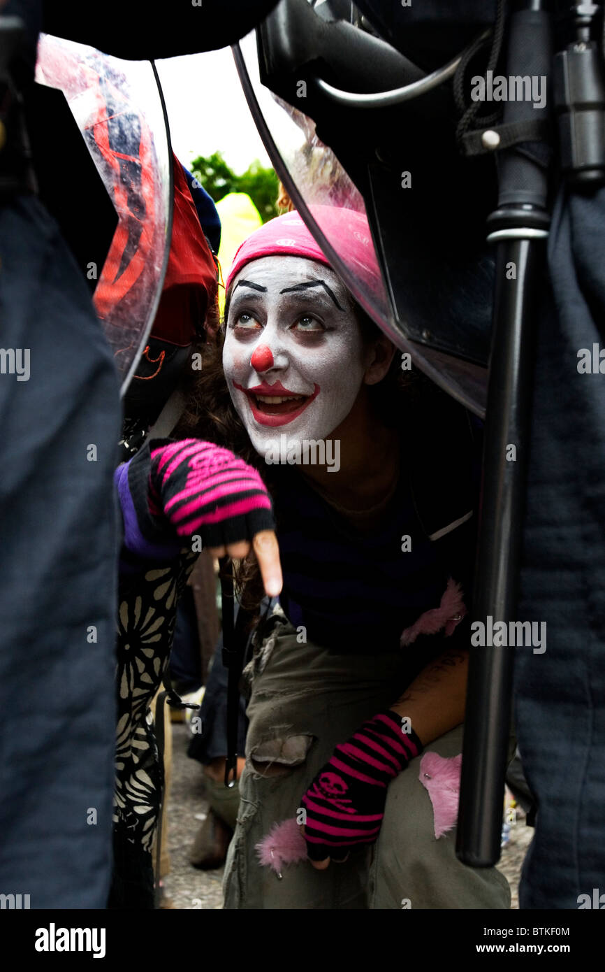 A climate change and extra runway protester blocked by riot police ...
