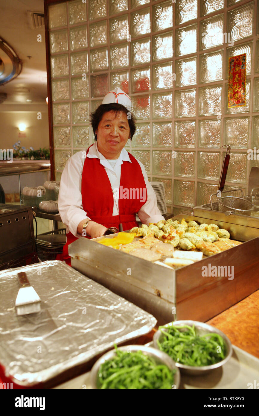 A cook in Chinatown, New York City, USA Stock Photo - Alamy