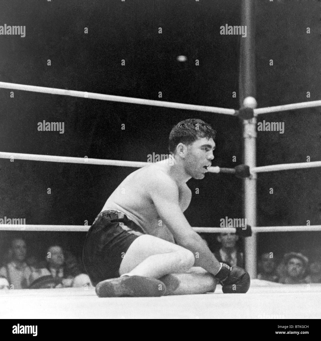 Max Schmeling (1905-2005), German heavyweight, knocked down during his ...