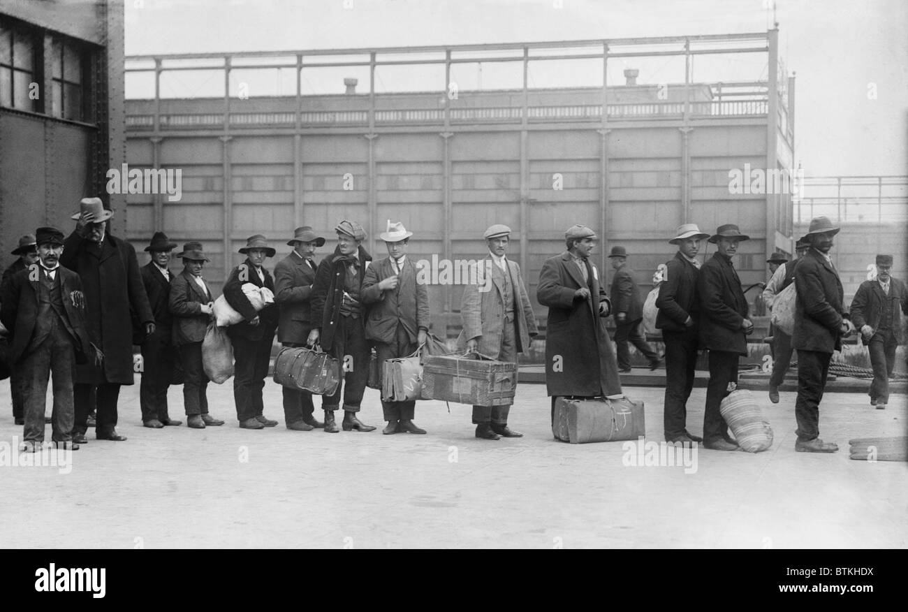 Italian men await admission processing at Ellis island, were among the ...