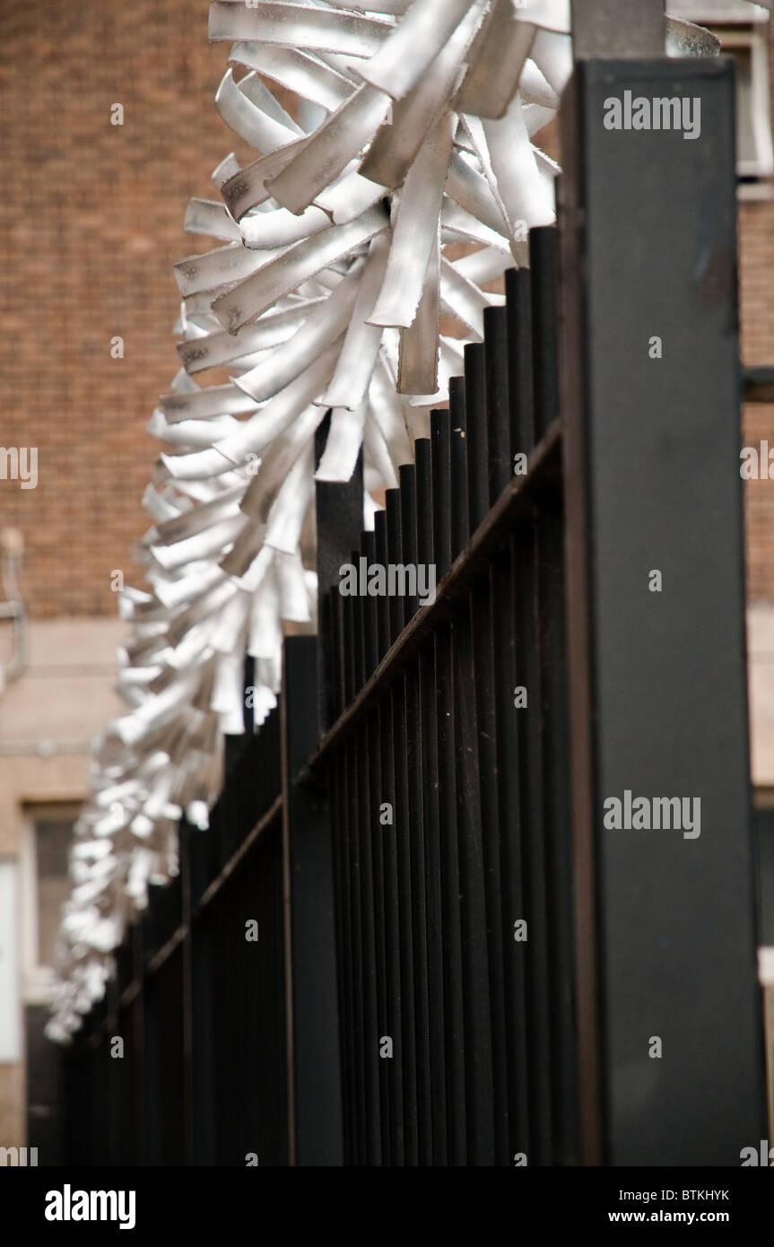 Spikes on top of a gate along the thames, London Stock Photo - Alamy