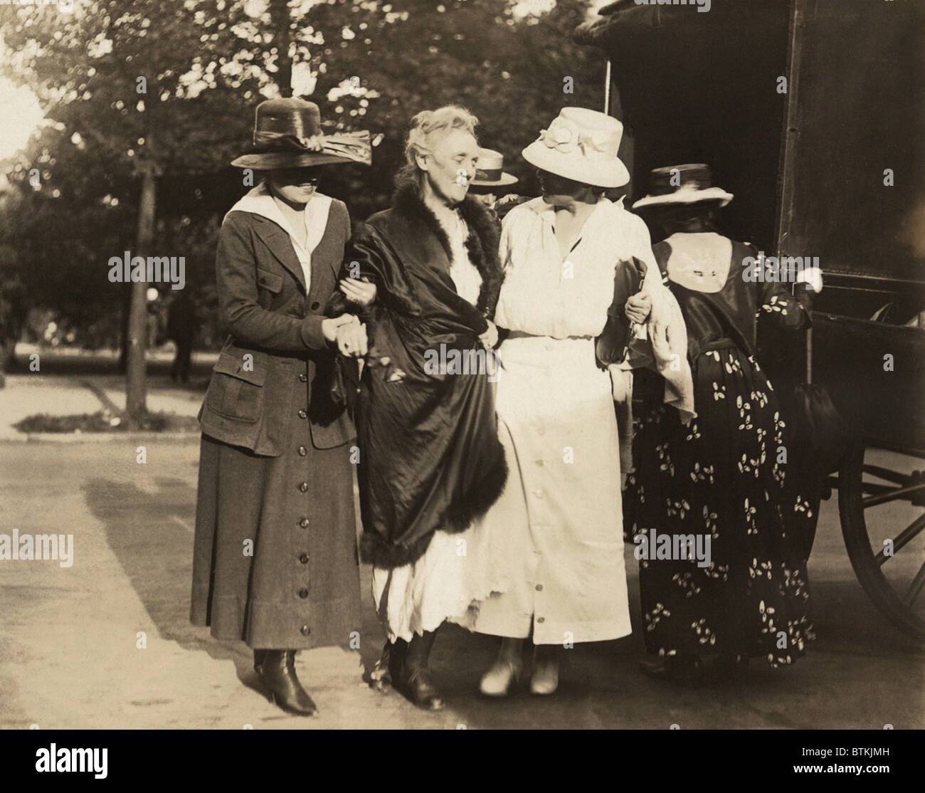 National Woman's Party activist, the elderly Dora Lewis, wrapped in ...