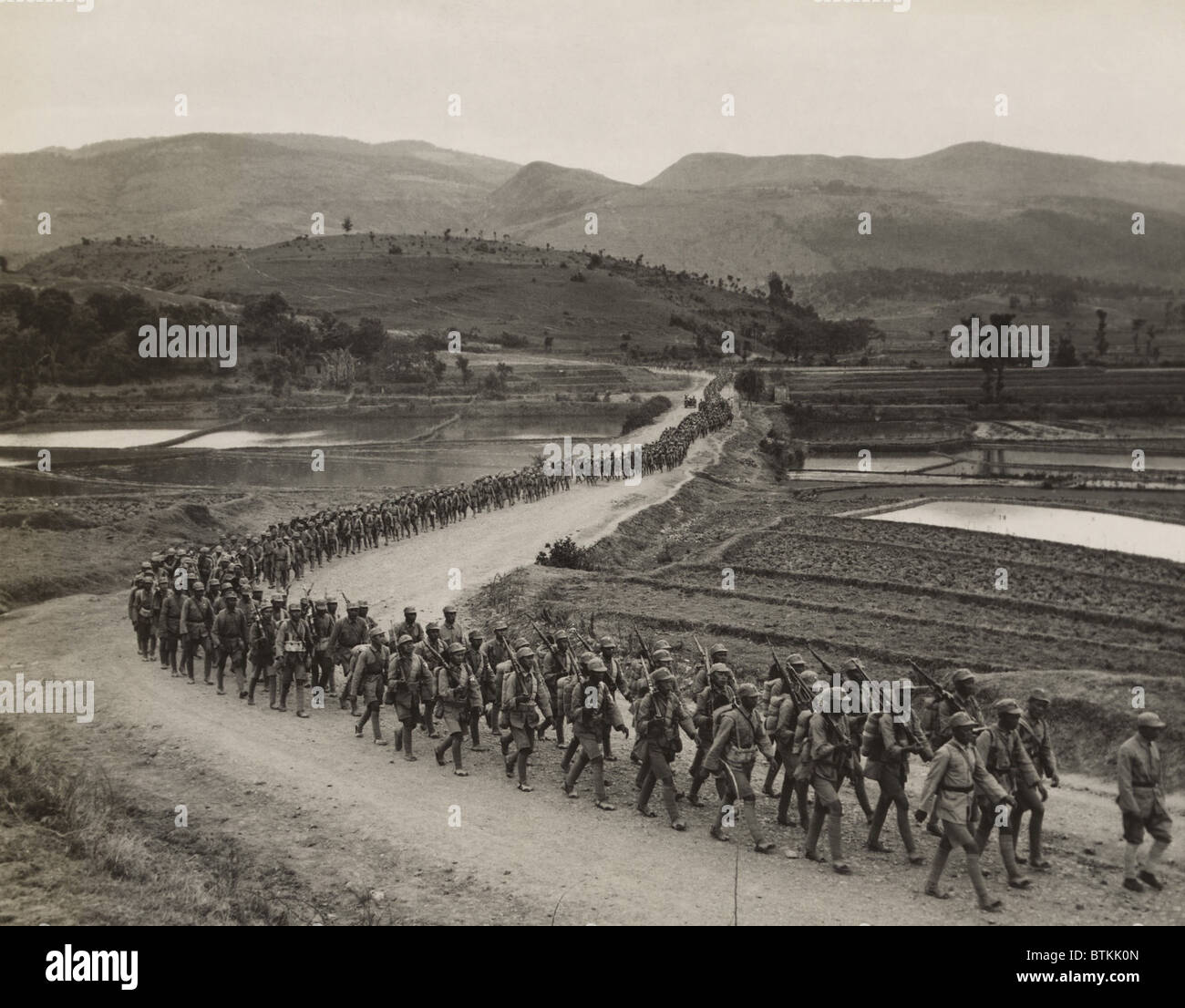 World War II. Chinese soldiers marching on the Burma Road toward the ...