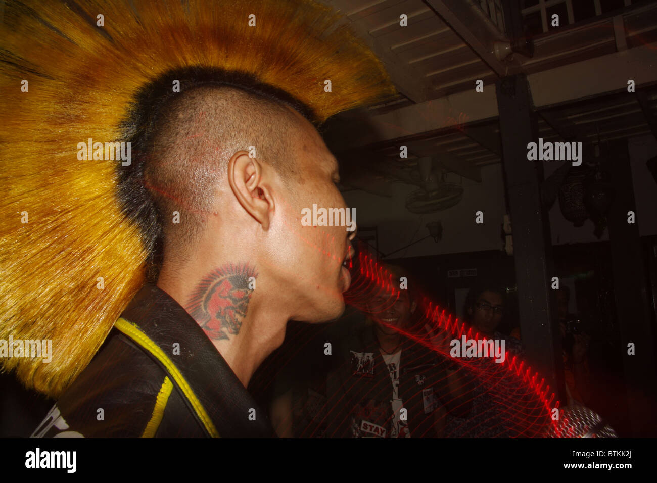 The singer of the All Dirtys, a Thai punk band, performing in Bangkok ...