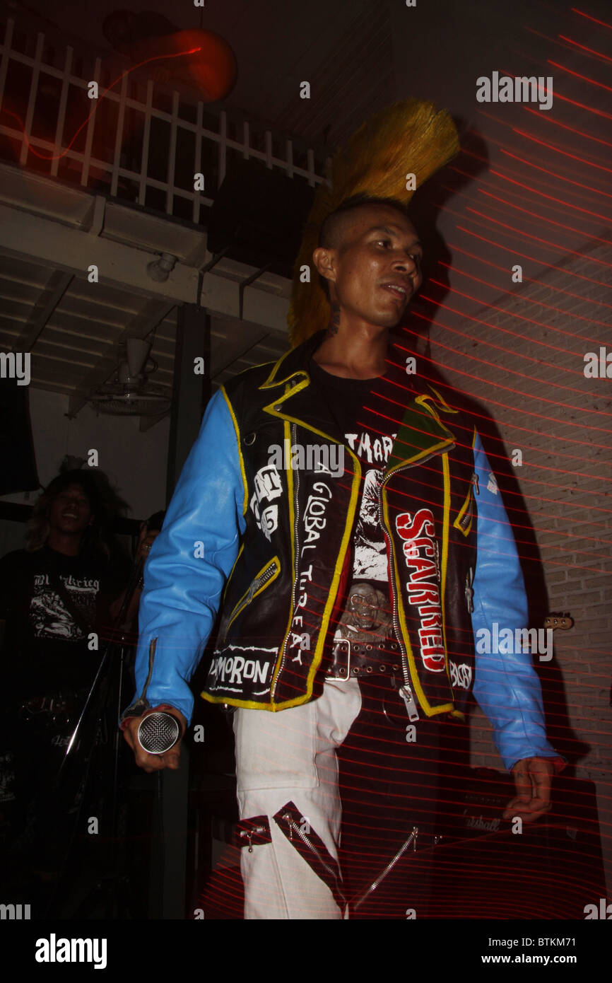 The singer of the All Dirtys, a Thai punk band, performing in Bangkok ...