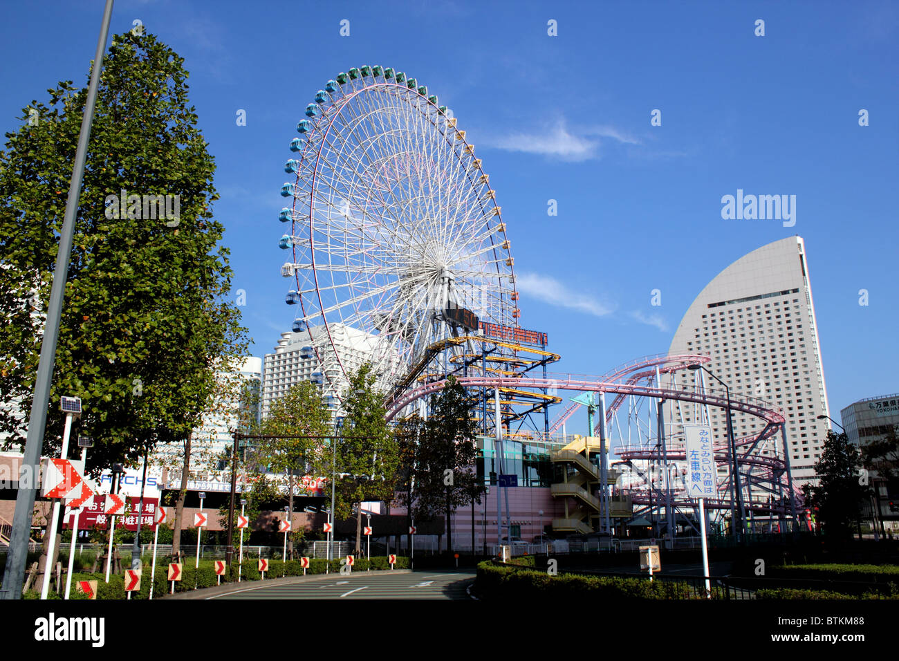 View of Cosmo World Ferris Wheel with Intercontinental Hotel in ...