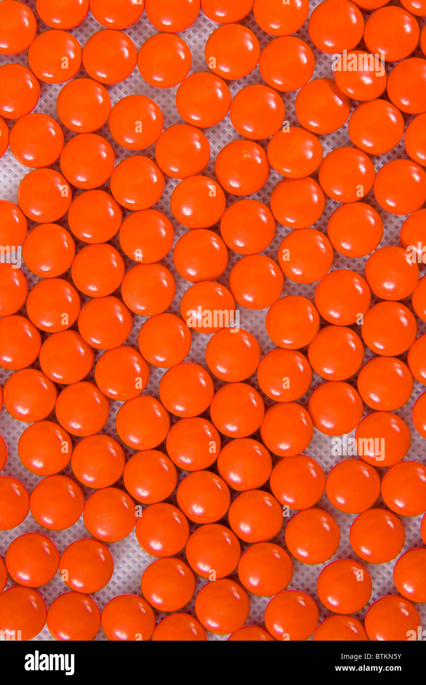 Background from set of tablets of orange colour Stock Photo - Alamy