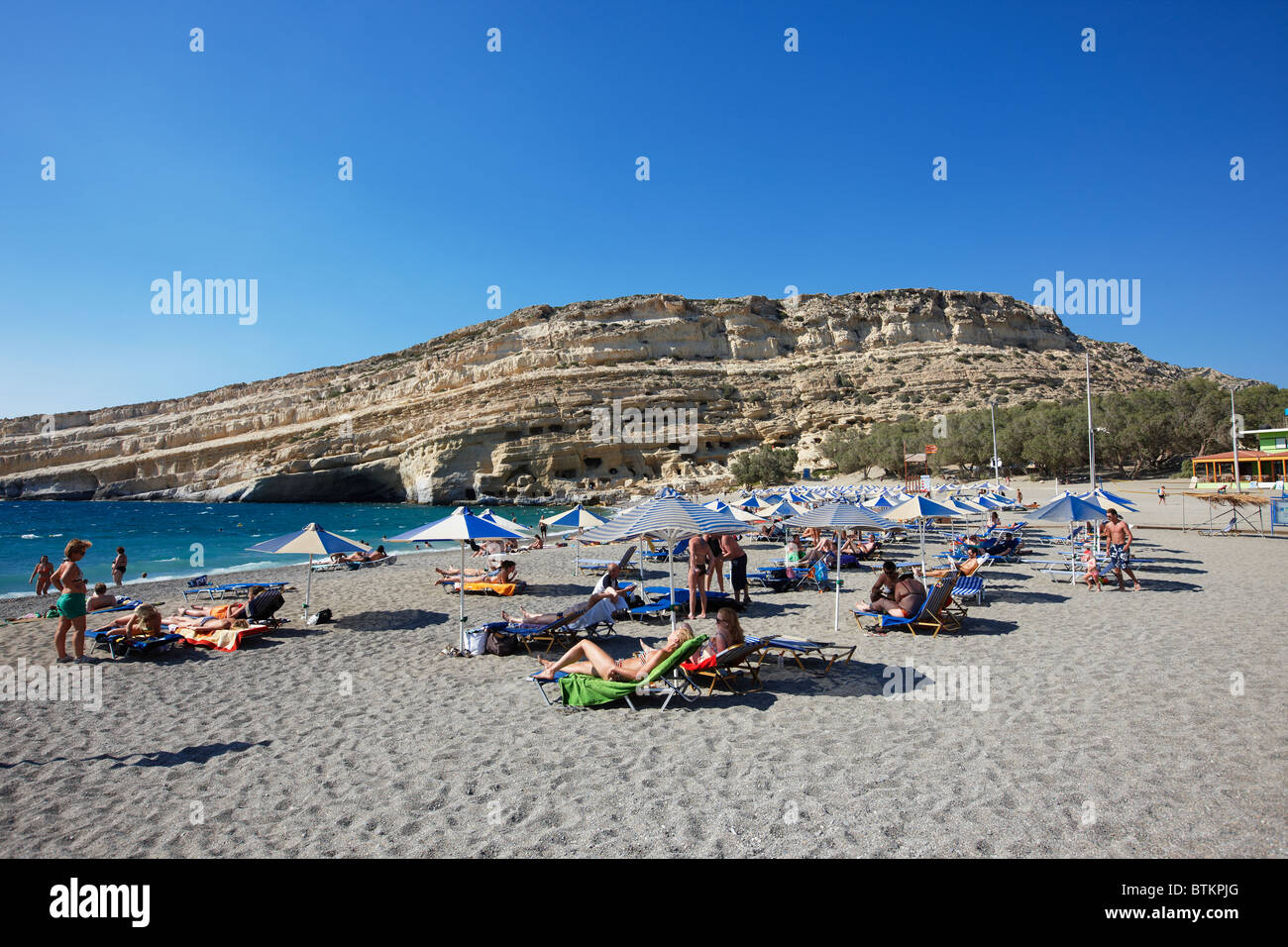 Greece beach sunbathing hi-res stock photography and images - Alamy