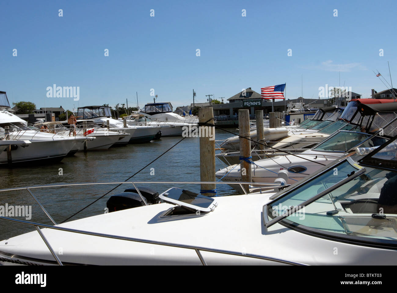 Boats in a marina on Fire Island New York Stock Photo - Alamy