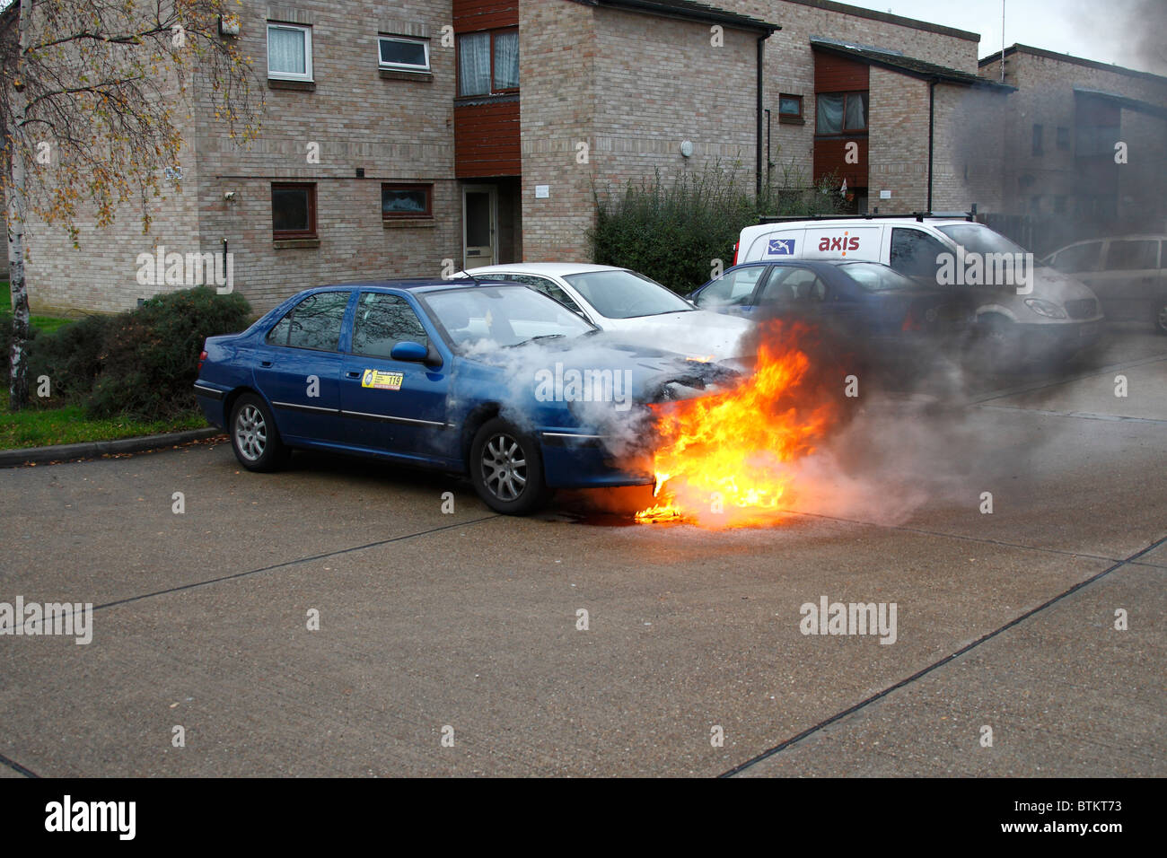 Car on fire Stock Photo - Alamy