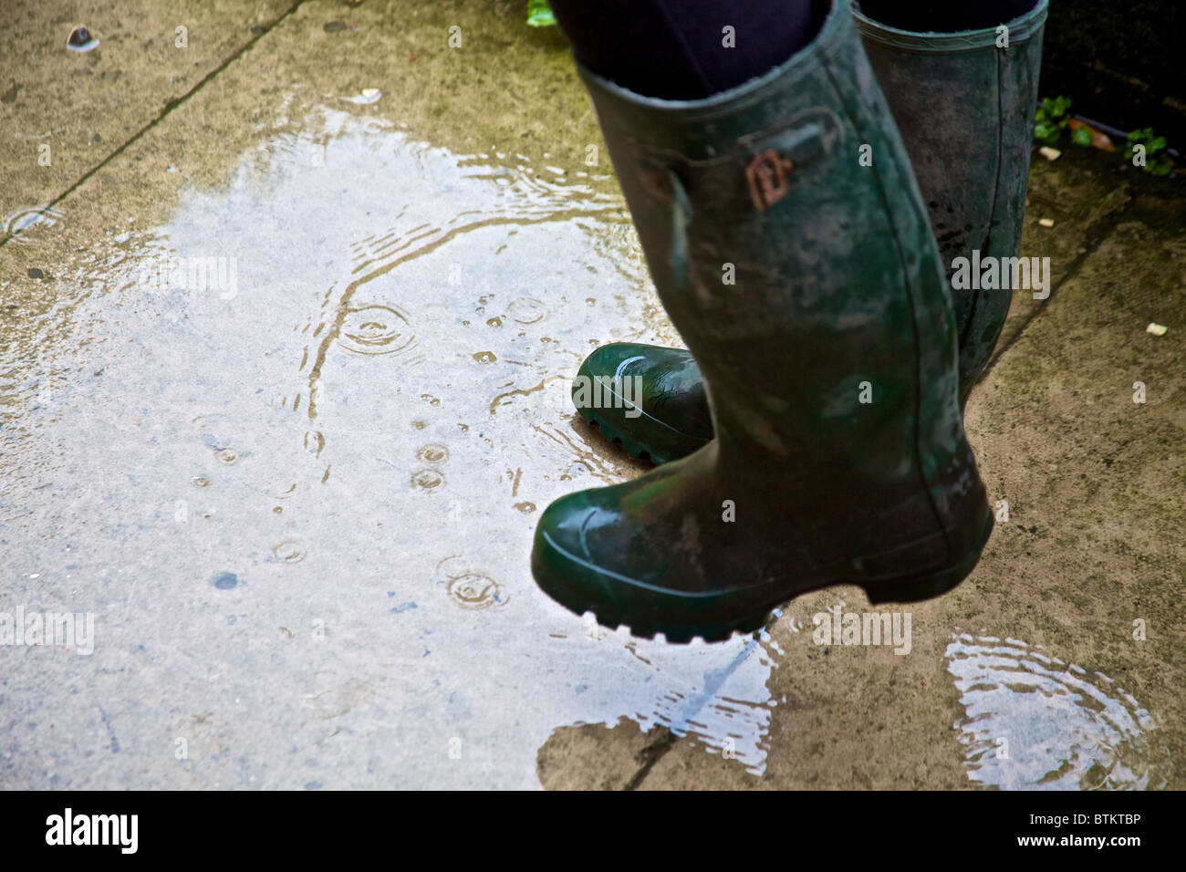 Wellies In Puddles Stock Photos & Wellies In Puddles Stock Images - Alamy