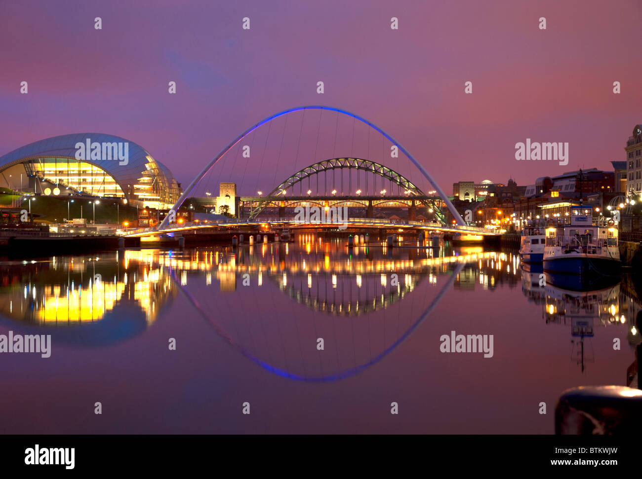 Reflections of the Millenium Bridge, Tyne Bridge on the River Tyne ...
