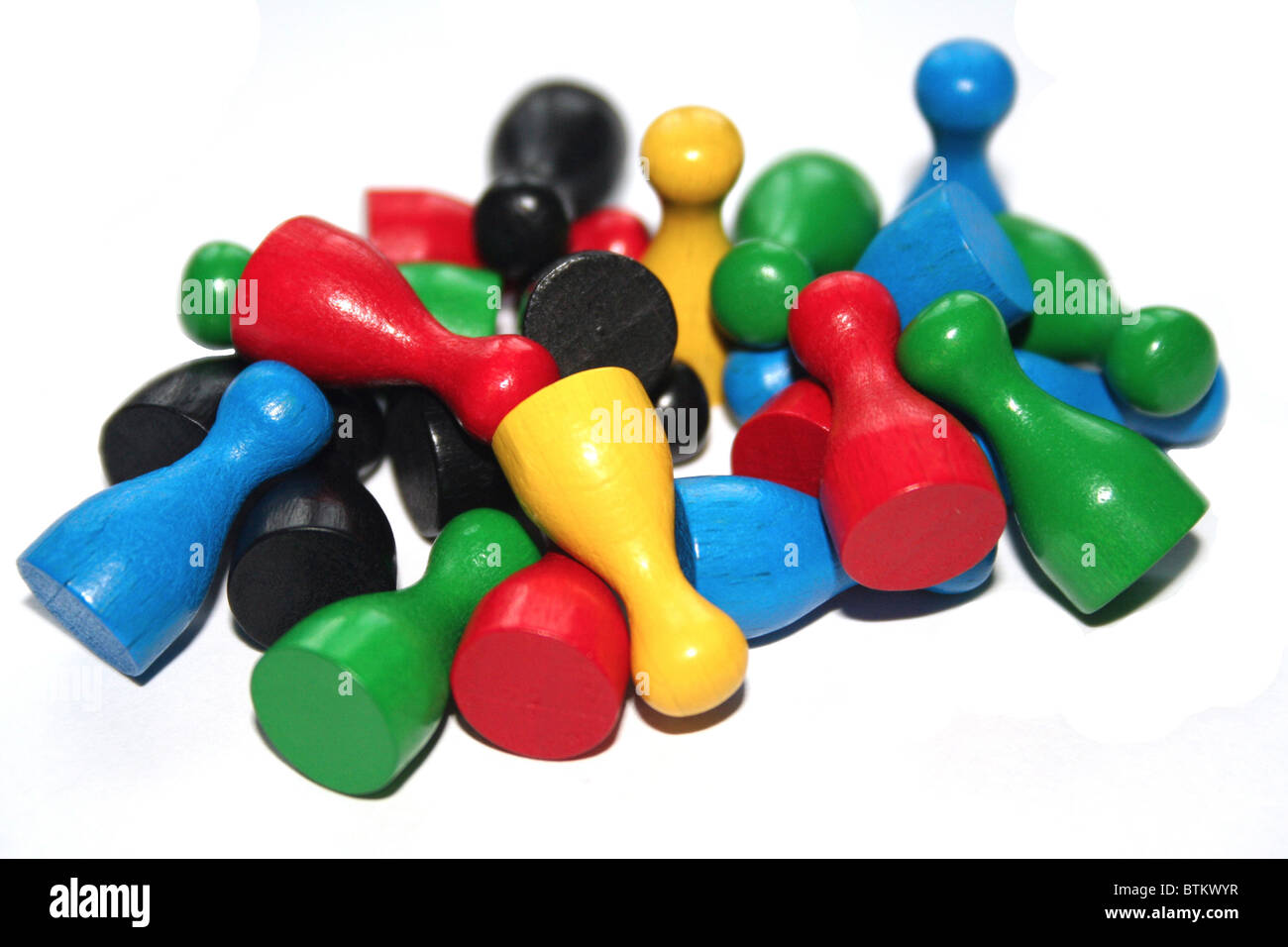Pile of colored tokens. All on white background Stock Photo - Alamy