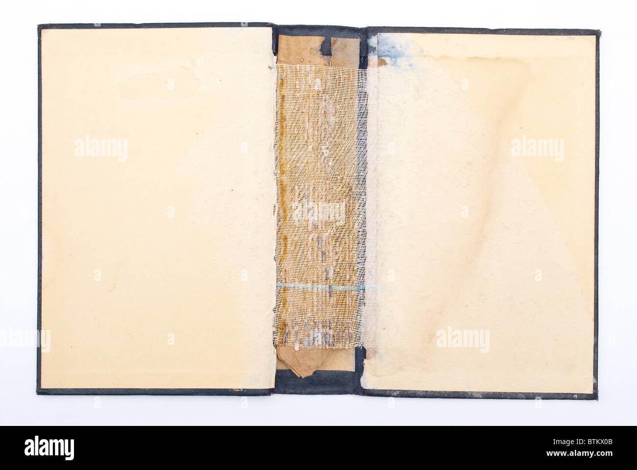 Ancient torn book Stock Photo - Alamy