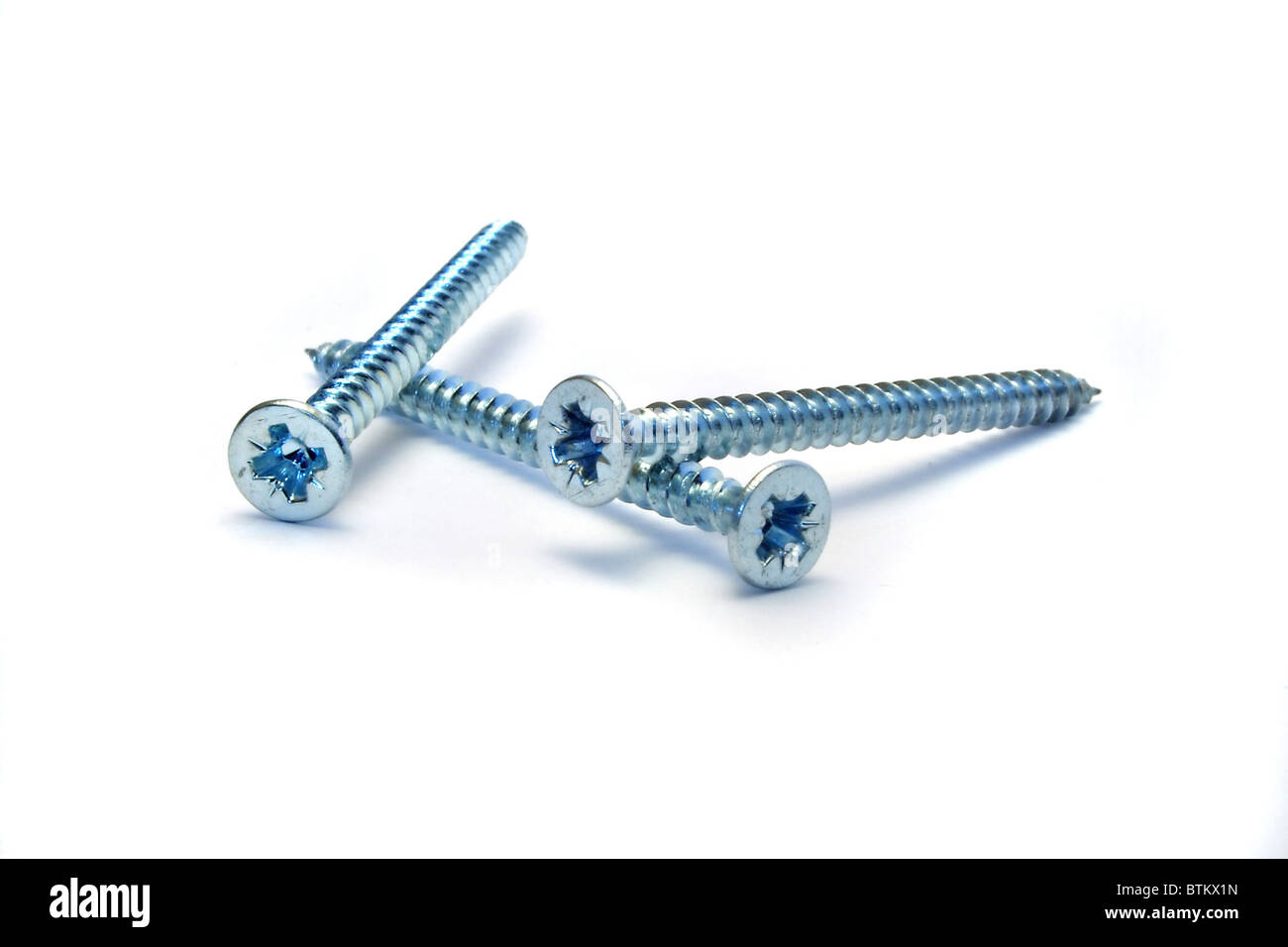 Three standard screws. All on white background Stock Photo - Alamy