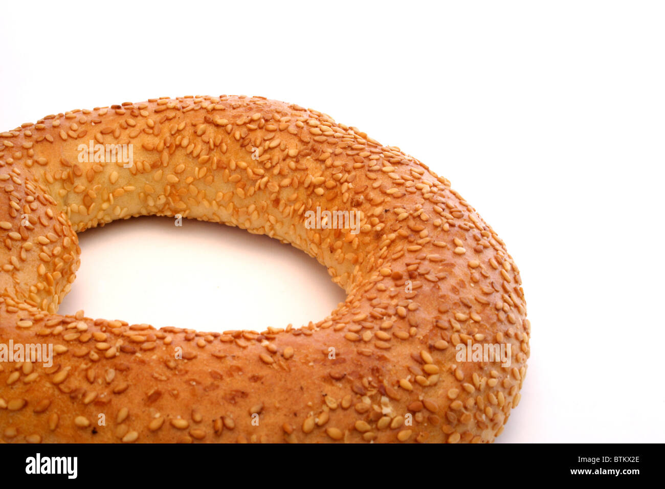 Freshly baked sesame ring. All on white background Stock Photo - Alamy