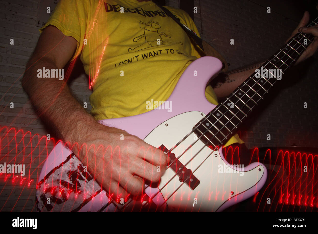 The bass player of The Pints, an Australian punk band performing in ...