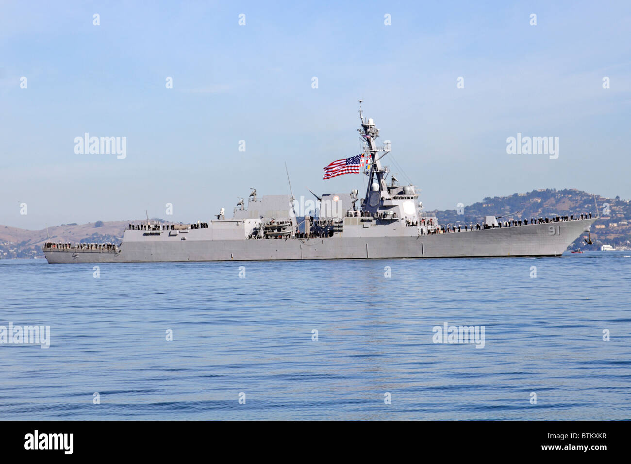 The guided-missile destroyer USS Pinckney (DDG 91) sails across San ...