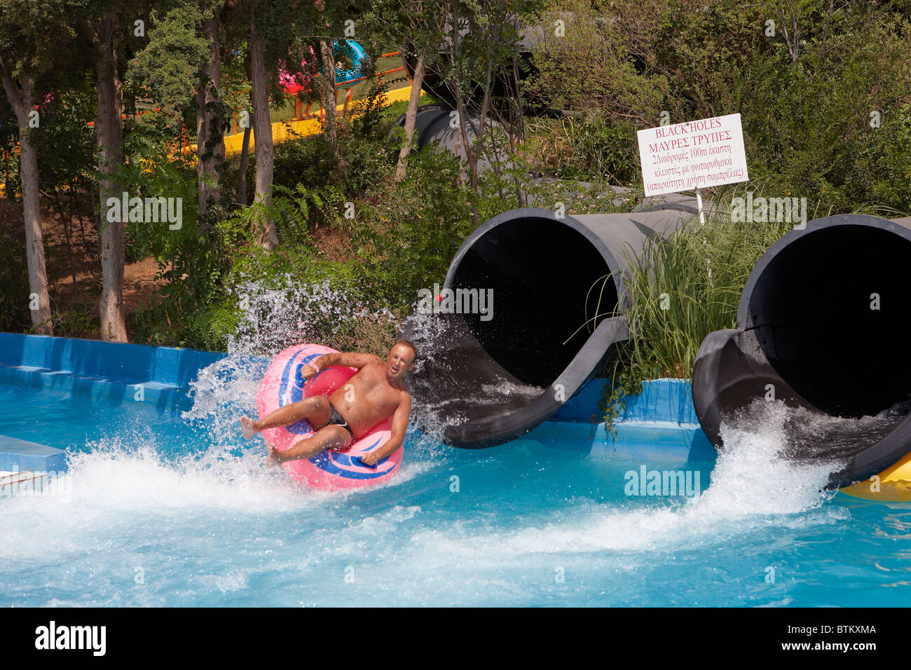 Watersliding in Acqua Plus Water park. Crete, Greece Stock Photo - Alamy