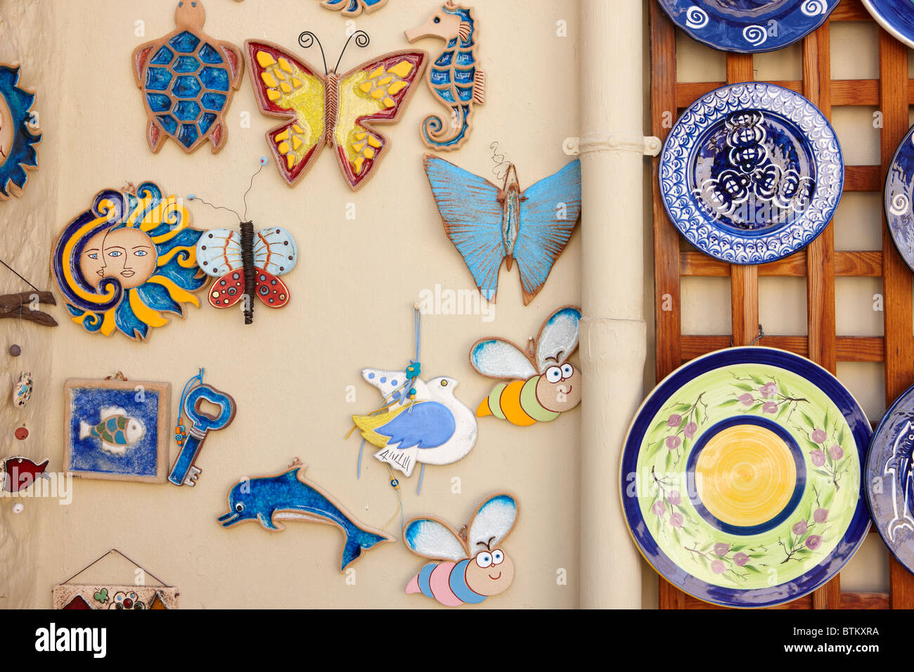 Colorful souvenirs displayed in a gift shop. Kritsa village, Crete ...