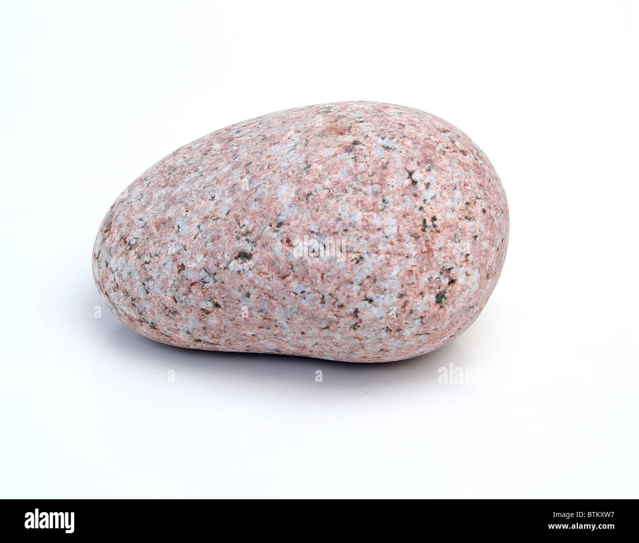 A slightly red pebble isolated on white Stock Photo - Alamy