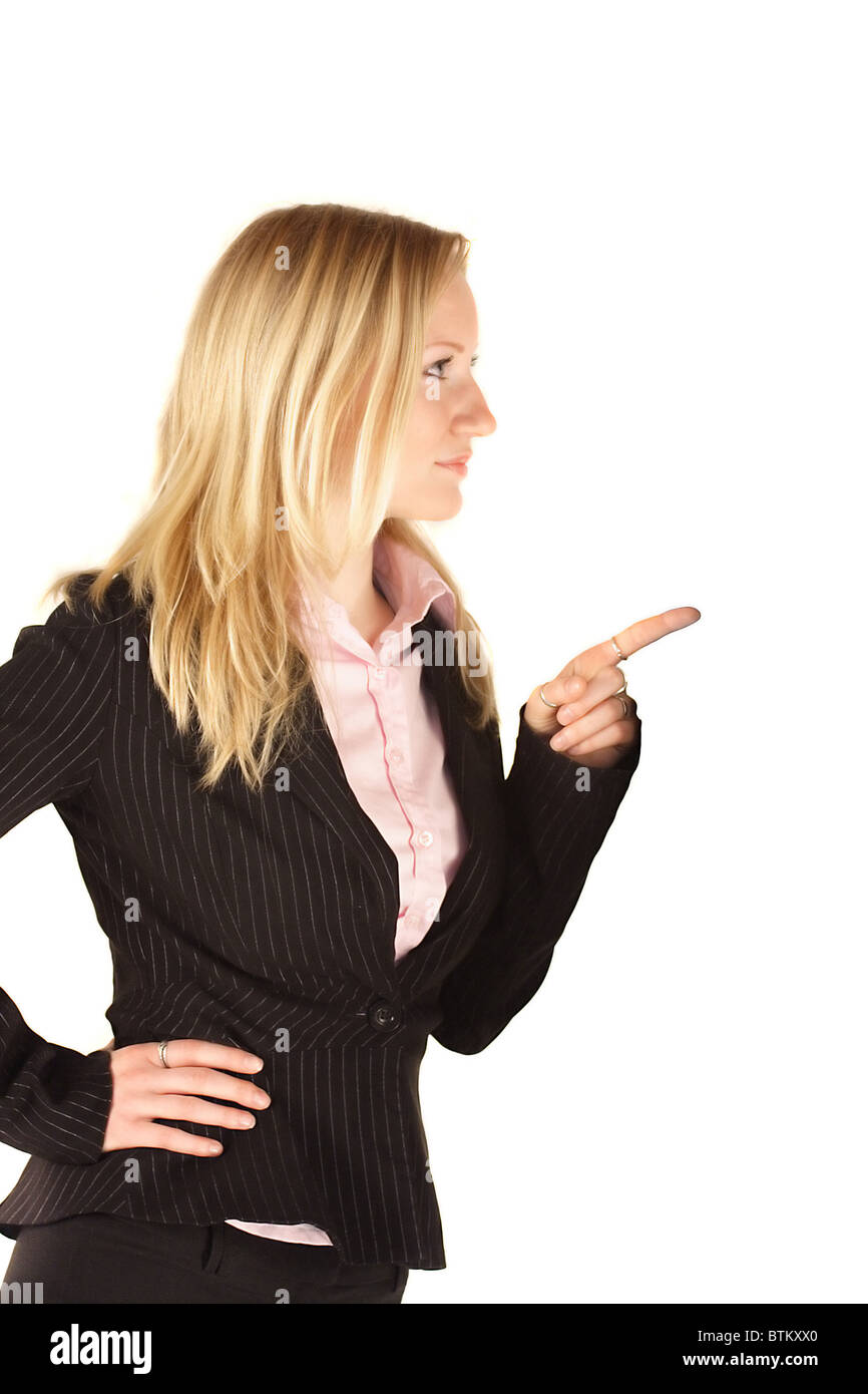 An angry young woman pointing at someone. All isolated on white ...