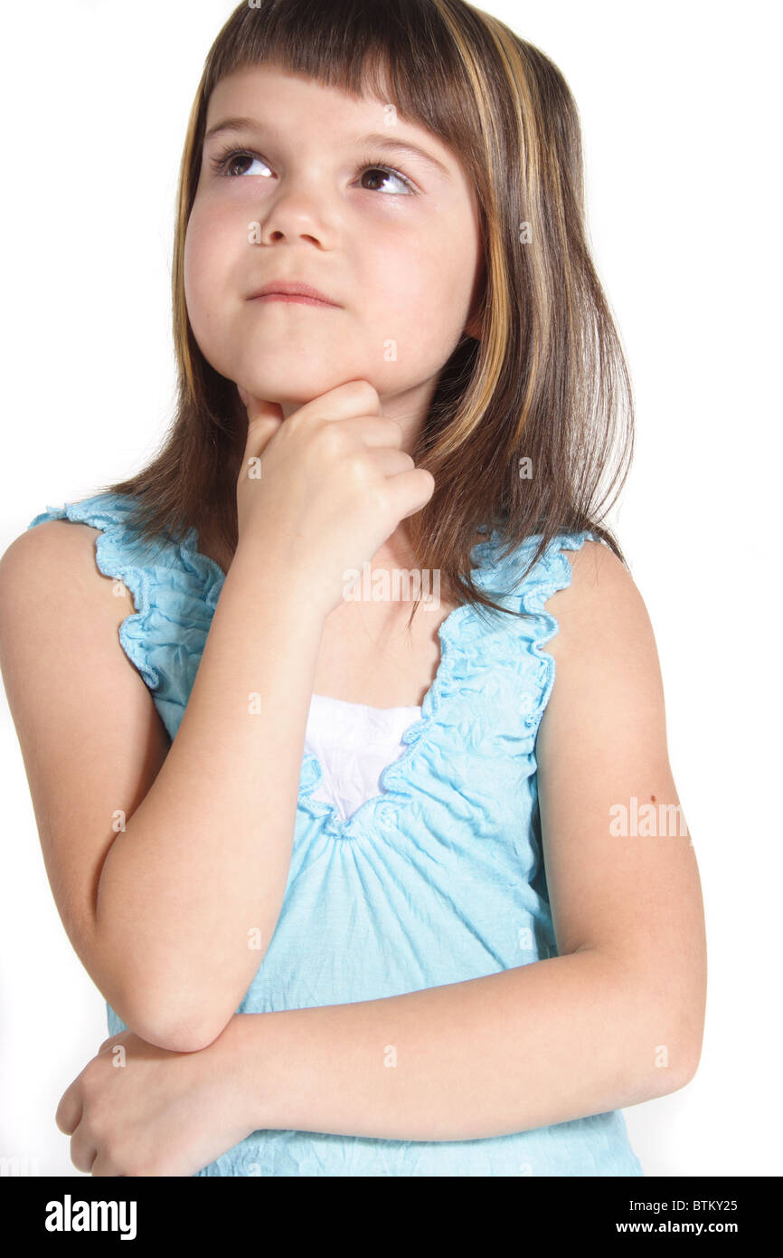 A young girl thinking about something. All isolated on white background ...